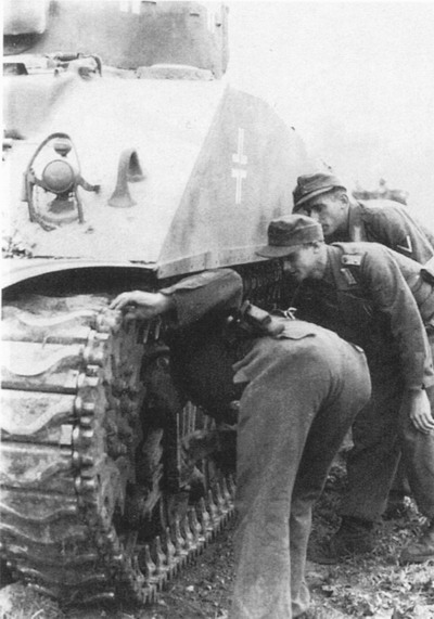 40 images of captured Sherman tanks in German hands!