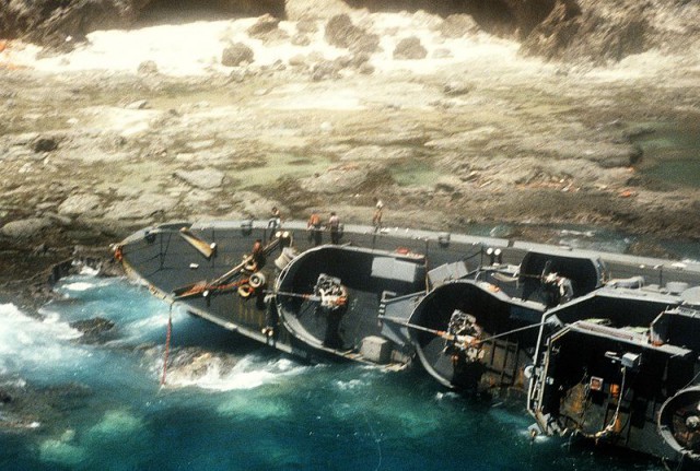 Death of the Former WWII warship USS Booth, shipwrecked on the rocks