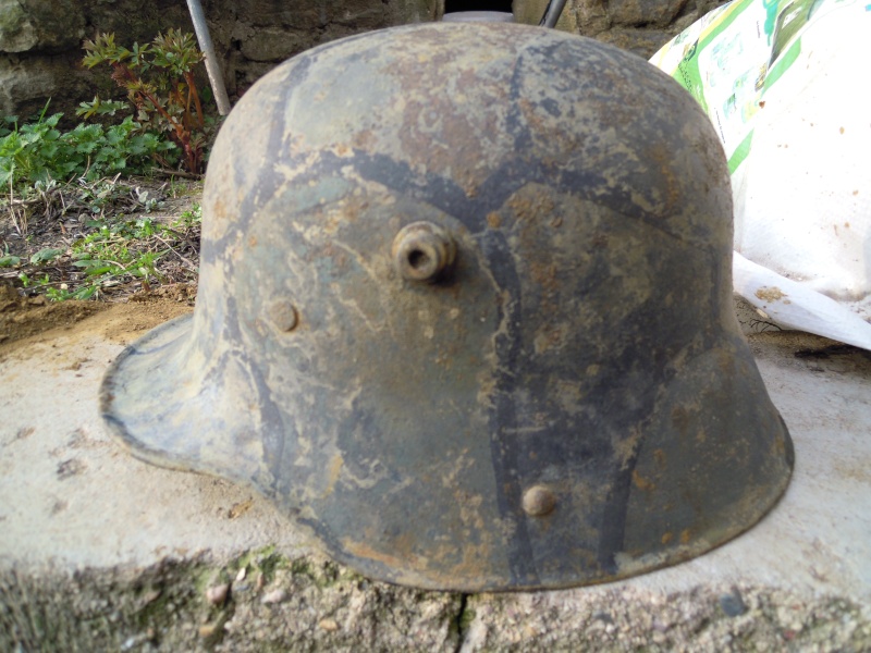 Battlefield relics dug up: Big collection of German helmets
