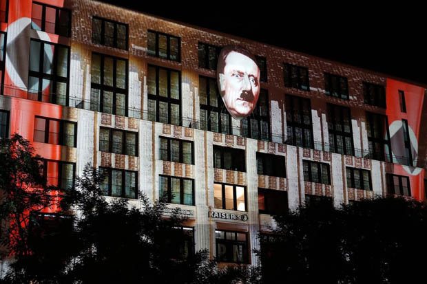 Artists Project Giant Image Of Hitler On Buildings, Causing Outcry In ...