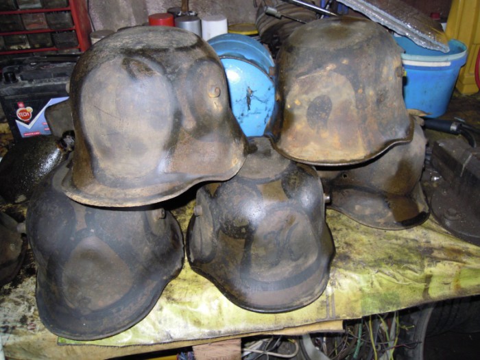 Battlefield relics dug up: Big collection of German helmets | War ...